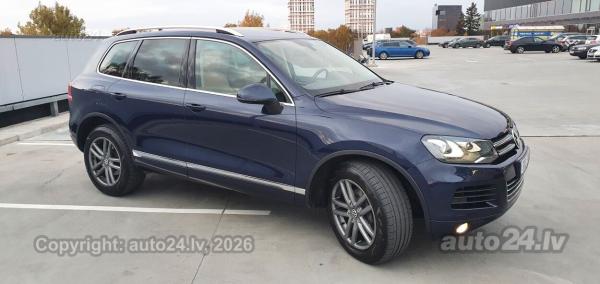 Blue Volkswagen Touareg 2013 in Tallinn, with an engine capacity of 3.00 L and mileage of 285 thousand km for 11990 €, photo 10 on AUTOMOTO.COM.LV