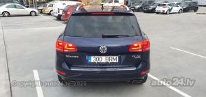 Blue Volkswagen Touareg 2013 in Tallinn, with an engine capacity of 3.00 L and mileage of 285 thousand km for 11990 €, photo 12 on AUTOMOTO.COM.LV