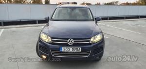 Blue Volkswagen Touareg 2013 in Tallinn, with an engine capacity of 3.00 L and mileage of 285 thousand km for 11990 €, photo 13 on AUTOMOTO.COM.LV