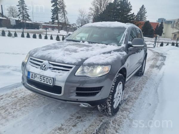 Brown Volkswagen Touareg 2007 in Riga, with an engine capacity of 3.00 L and mileage of 320 thousand km for 4700 €, photo 4 on AUTOMOTO.COM.LV