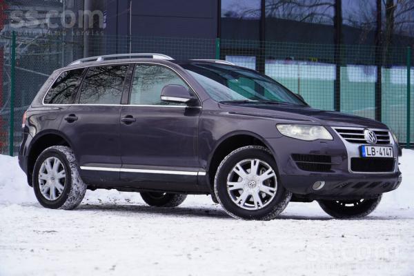 Brown Volkswagen Touareg 2008 in Riga, with an engine capacity of 3.00 L and mileage of 410 thousand km for 4990 €, photo 2 on AUTOMOTO.COM.LV