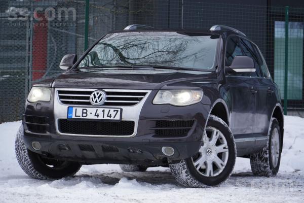 Brown Volkswagen Touareg 2008 in Riga, with an engine capacity of 3.00 L and mileage of 410 thousand km for 4990 €, photo 3 on AUTOMOTO.COM.LV