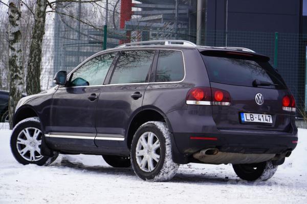 Brown Volkswagen Touareg 2008 in Riga, with an engine capacity of 3.00 L and mileage of 410 thousand km for 4990 €, photo 5 on AUTOMOTO.COM.LV