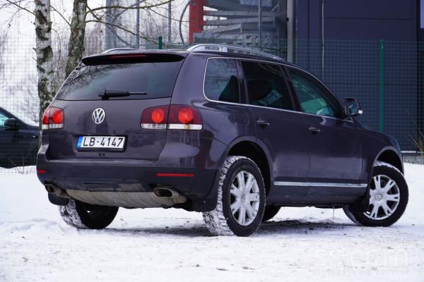 Brown Volkswagen Touareg 2008 in Riga, with an engine capacity of 3.00 L and mileage of 410 thousand km for 4990 €, photo 7 on AUTOMOTO.COM.LV