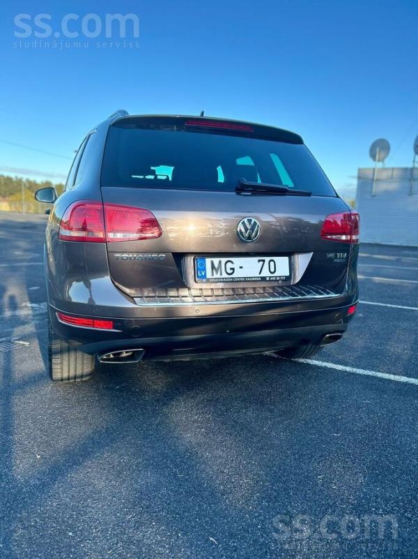 Brown Volkswagen Touareg 2010 in Riga, with an engine capacity of 3.00 L and mileage of 305 thousand km for 9700 €, photo 3 on AUTOMOTO.COM.LV