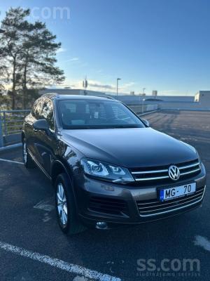 Brown Volkswagen Touareg 2010 in Riga, with an engine capacity of 3.00 L and mileage of 305 thousand km for 9700 €, photo 6 on AUTOMOTO.COM.LV