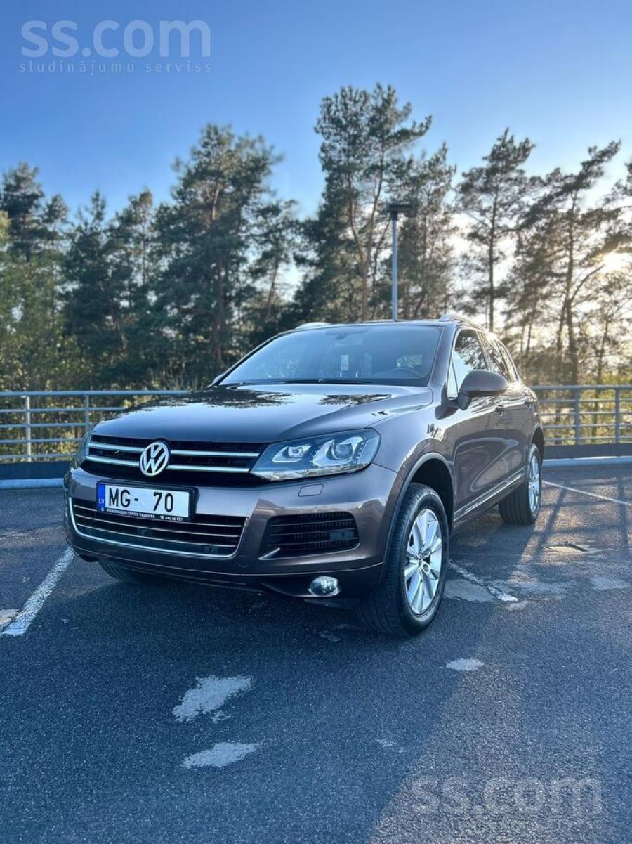 Brown Volkswagen Touareg 2010 in Riga, with an engine capacity of 3.00 L and mileage of 305 thousand km for 9700 €, photo 7 on AUTOMOTO.COM.LV