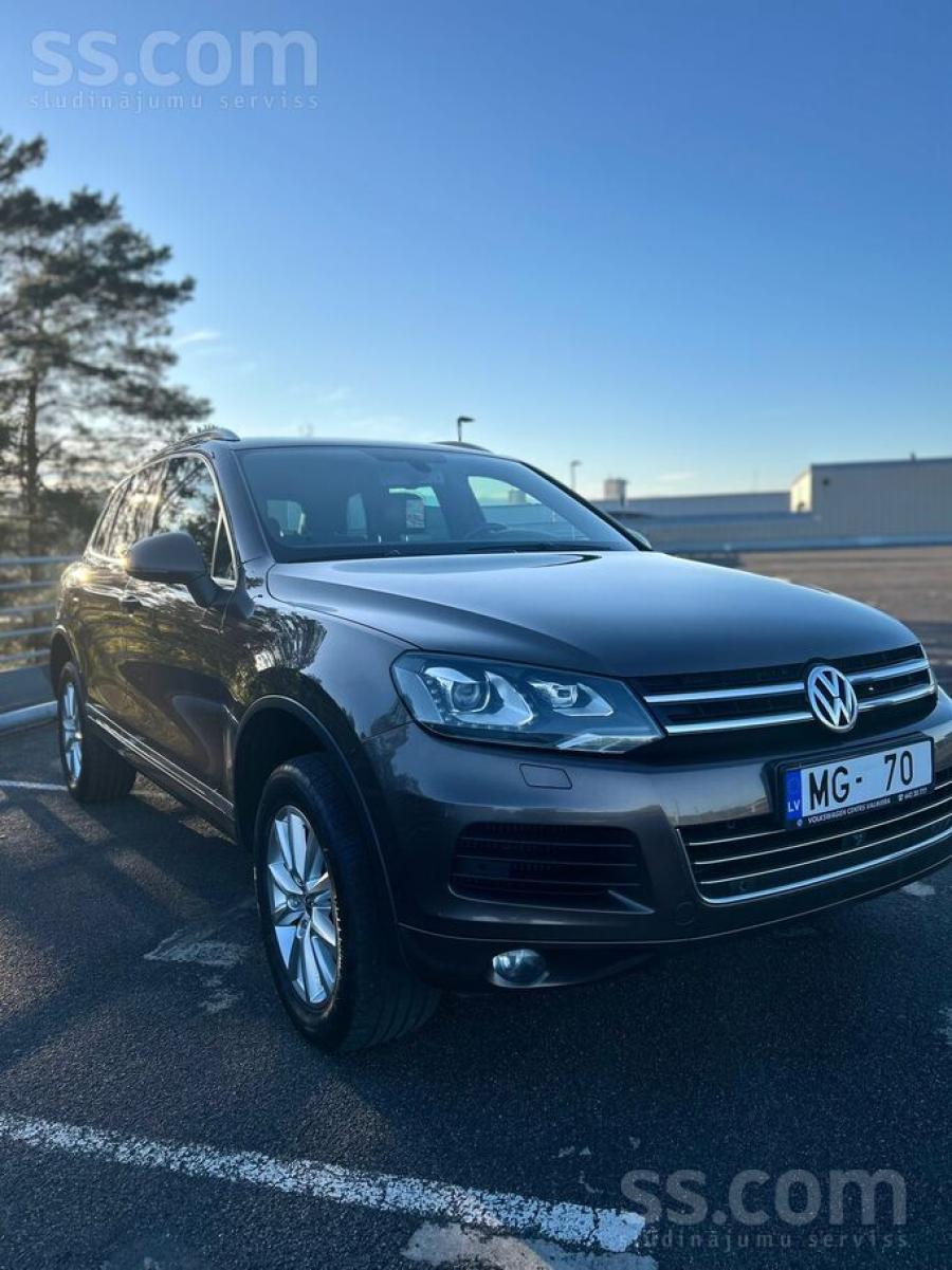 Brown Volkswagen Touareg 2010 in Riga, with an engine capacity of 3.00 L and mileage of 305 thousand km for 9700 €, photo 8 on AUTOMOTO.COM.LV