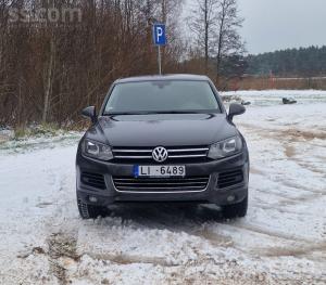 Brown Volkswagen Touareg 2010 in Jurmala, with an engine capacity of 3.00 L and mileage of 250 thousand km for 11850 €, photo 2 on AUTOMOTO.COM.LV