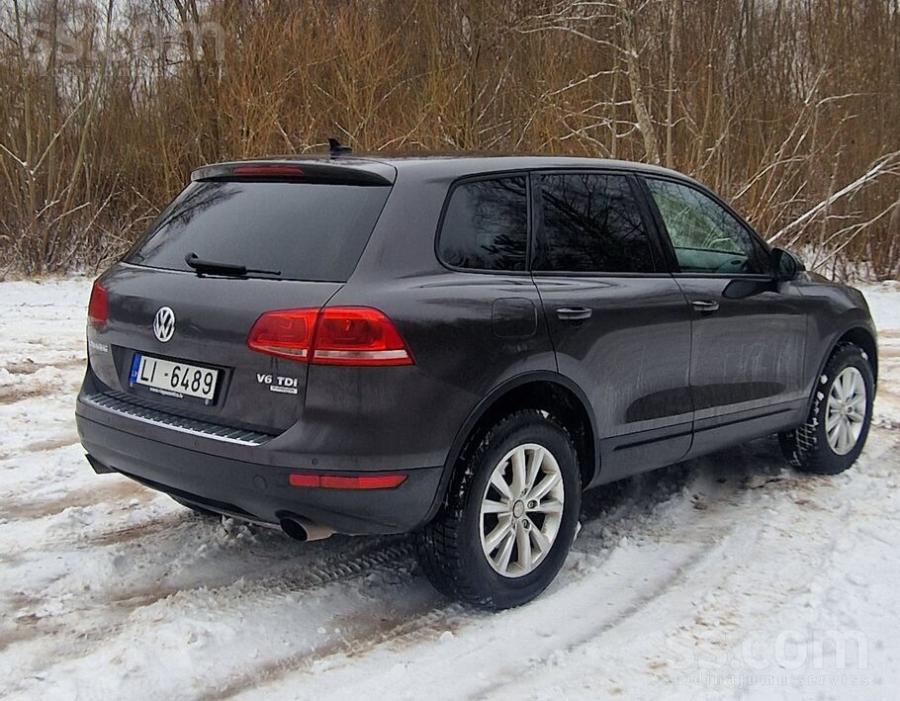 Brown Volkswagen Touareg 2010 in Jurmala, with an engine capacity of 3.00 L and mileage of 250 thousand km for 11850 €, photo 4 on AUTOMOTO.COM.LV