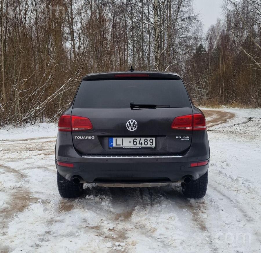 Brown Volkswagen Touareg 2010 in Jurmala, with an engine capacity of 3.00 L and mileage of 250 thousand km for 11850 €, photo 5 on AUTOMOTO.COM.LV