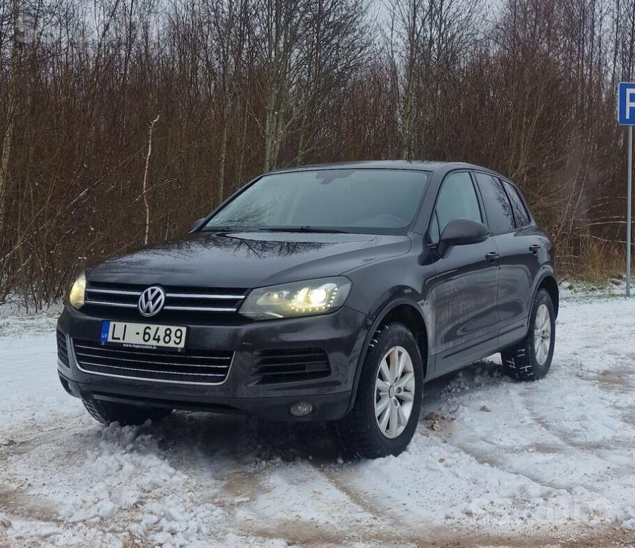 Brown Volkswagen Touareg 2010 in Jurmala, with an engine capacity of 3.00 L and mileage of 250 thousand km for 11850 €, photo 8 on AUTOMOTO.COM.LV