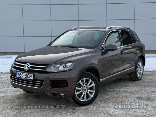 Brown Volkswagen Touareg 2010 in Tartu, with an engine capacity of 3.00 L and mileage of 239 thousand km for 9500 €, photo 1 on AUTOMOTO.COM.LV
