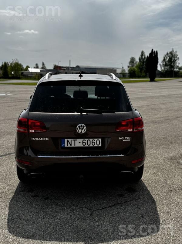 Brown Volkswagen Touareg 2010 in Riga, with an engine capacity of 3.00 L and mileage of 322 thousand km for 10500 €, photo 6 on AUTOMOTO.COM.LV