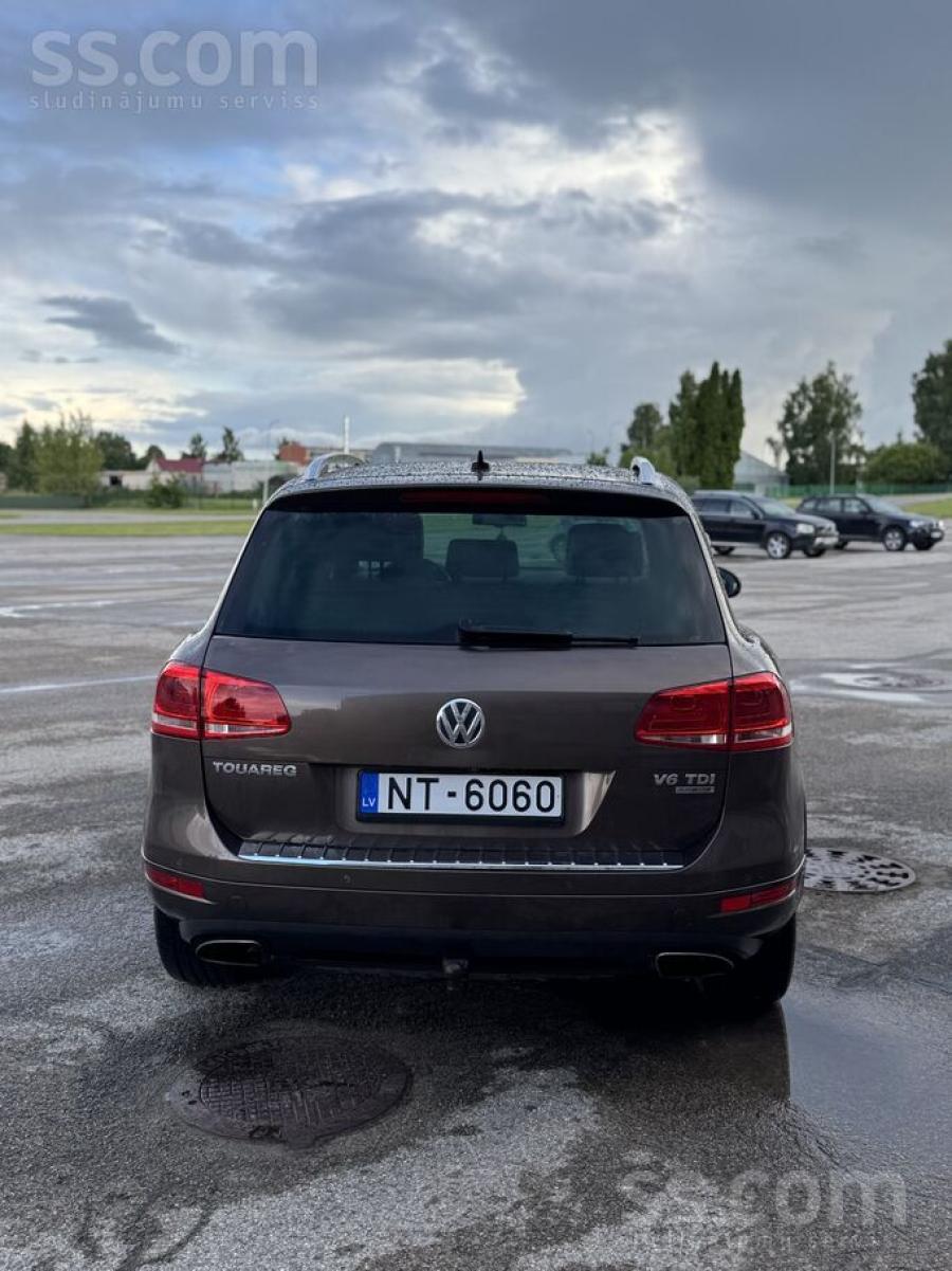 Brown Volkswagen Touareg 2010 in Riga, with an engine capacity of 3.00 L and mileage of 322 thousand km for 7100 €, photo 5 on AUTOMOTO.COM.LV