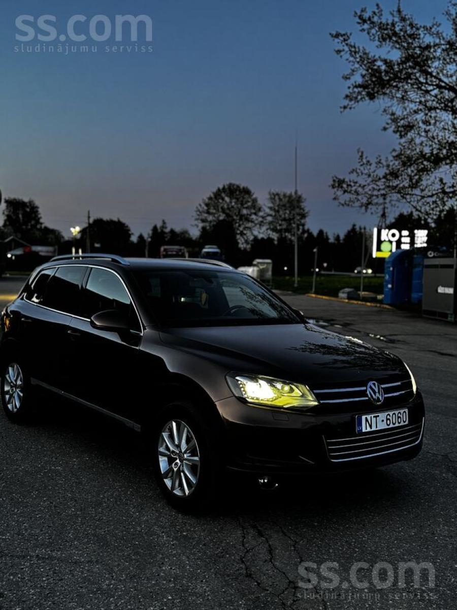 Brown Volkswagen Touareg 2010 in Riga, with an engine capacity of 3.00 L and mileage of 322 thousand km for 7100 €, photo 10 on AUTOMOTO.COM.LV