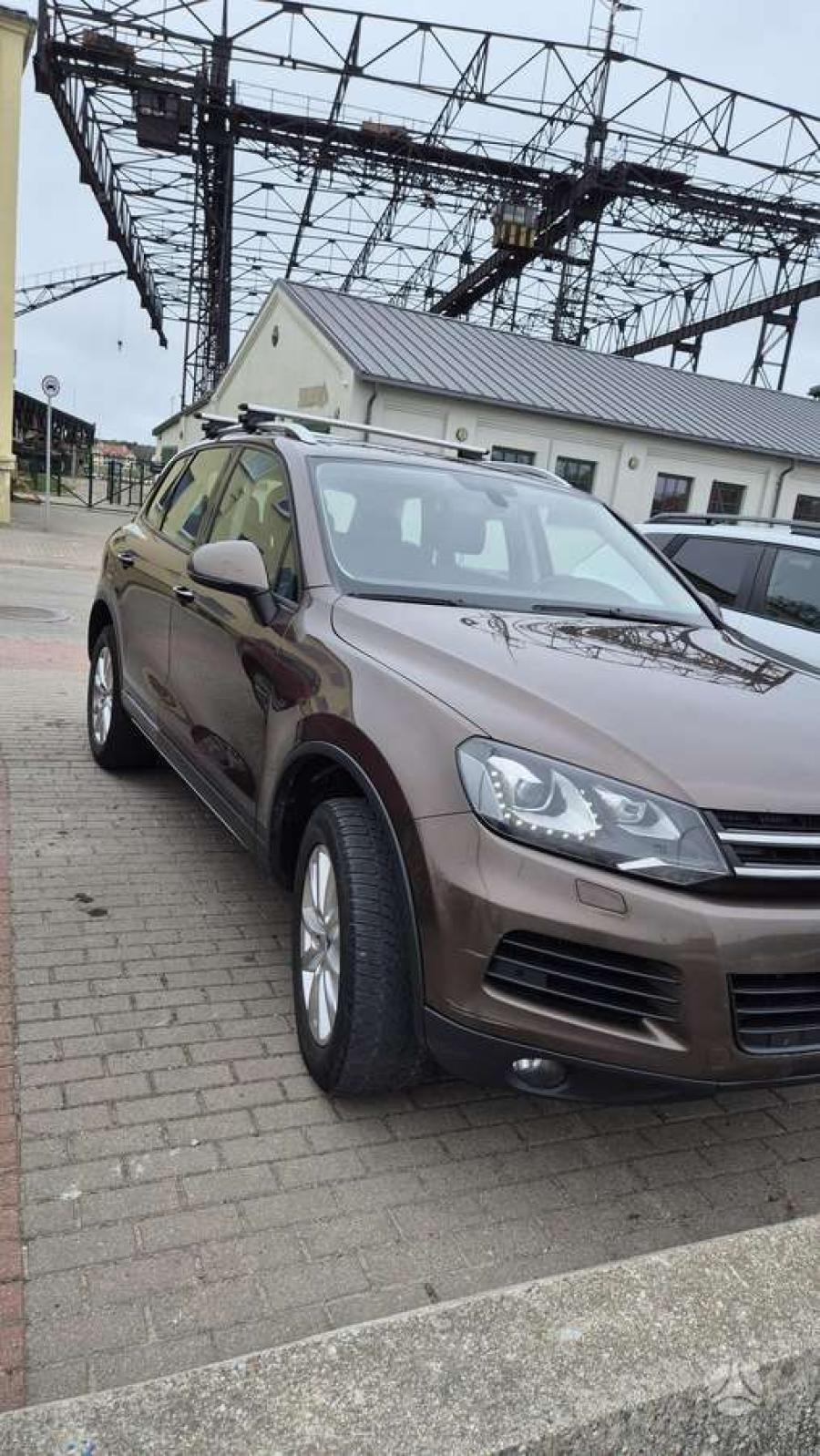 Brown Volkswagen Touareg 2010 in Klaipeda, with an engine capacity of 2.97 L and mileage of 311 thousand km for 7800 €, photo 5 on AUTOMOTO.COM.LV