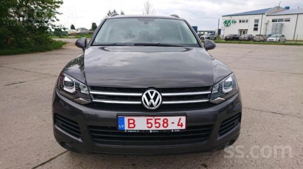 Brown Volkswagen Touareg 2010 in Riga, with an engine capacity of 3.00 L and mileage of 305 thousand km for 13900 €, photo 2 on AUTOMOTO.COM.LV
