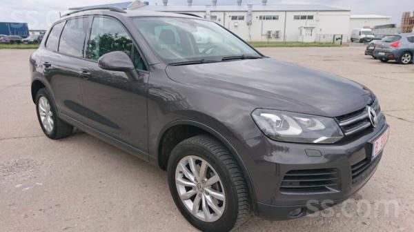 Brown Volkswagen Touareg 2010 in Riga, with an engine capacity of 3.00 L and mileage of 305 thousand km for 13900 €, photo 3 on AUTOMOTO.COM.LV