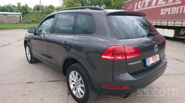 Brown Volkswagen Touareg 2010 in Riga, with an engine capacity of 3.00 L and mileage of 305 thousand km for 13900 €, photo 7 on AUTOMOTO.COM.LV