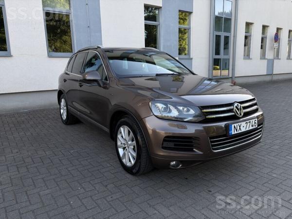 Brūns Volkswagen Touareg 2010 Jelgava, ar dzinēja tilpumu 3.00 L un nobraukumu 298 tūkst. km par 11900 €, foto 1 vietnē AUTOMOTO.COM.LV