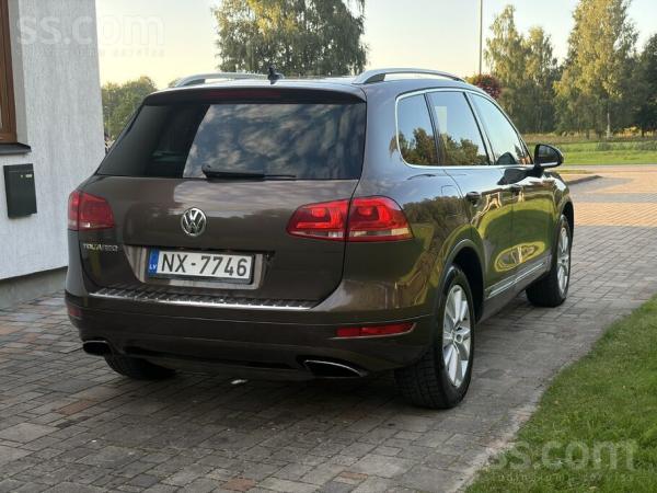 Volkswagen Touareg 2010 Jelgava vietnē Brūns Volkswagen Touareg 2010 Jelgava, ar dzinēja tilpumu 3.00 L un nobraukumu 298 tūkst. km par 9500 €, foto 5 vietnē AUTOMOTO.COM.LV