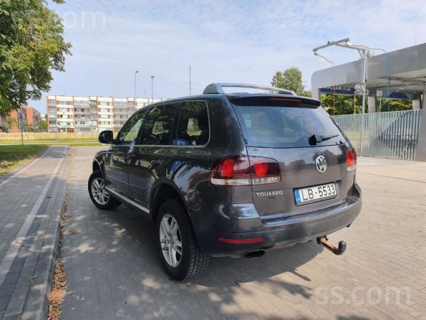 Brown Volkswagen Touareg 2010 in Rezekne, with an engine capacity of 2.50 L and mileage of 280 thousand km for 4900 €, photo 4 on AUTOMOTO.COM.LV