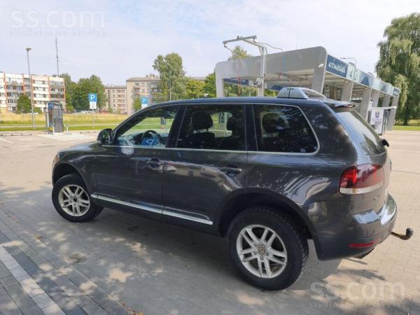 Brown Volkswagen Touareg 2010 in Rezekne, with an engine capacity of 2.50 L and mileage of 280 thousand km for 4900 €, photo 5 on AUTOMOTO.COM.LV