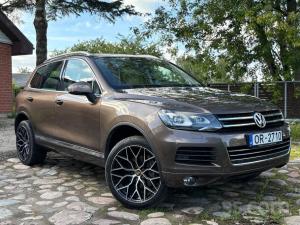 Brown Volkswagen Touareg 2010 in Saldus, with an engine capacity of 3.00 L and mileage of 255 thousand km for 9650 €, photo  on AUTOMOTO.COM.LV