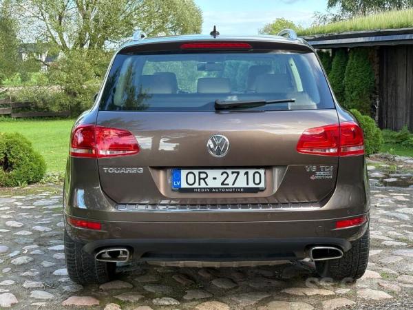 Brown Volkswagen Touareg 2010 in Saldus, with an engine capacity of 3.00 L and mileage of 255 thousand km for 9650 €, photo 5 on AUTOMOTO.COM.LV