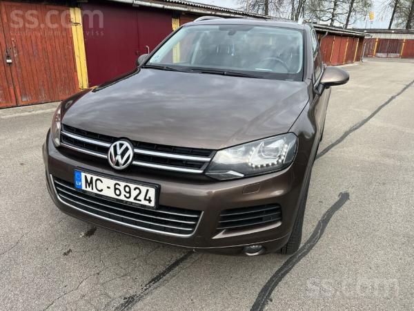 Brūns Volkswagen Touareg 2011 Rīga, ar dzinēja tilpumu 3.00 L un nobraukumu 288 tūkst. km par 11500 €, foto 1 vietnē AUTOMOTO.COM.LV