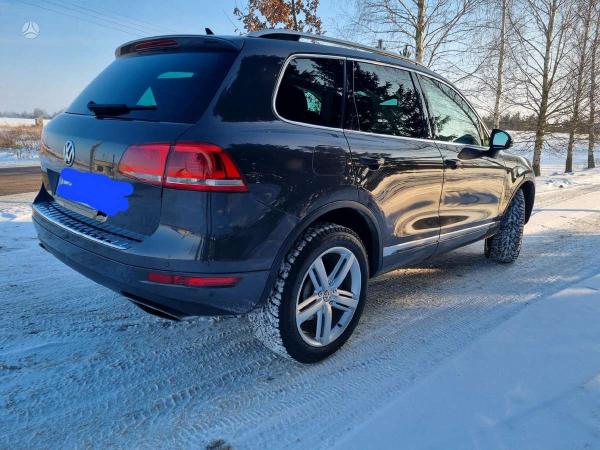 Brūns Volkswagen Touareg 2011 Marijampole, ar dzinēja tilpumu 3.00 L un nobraukumu 295 tūkst. km par 9550 €, foto 3 vietnē AUTOMOTO.COM.LV