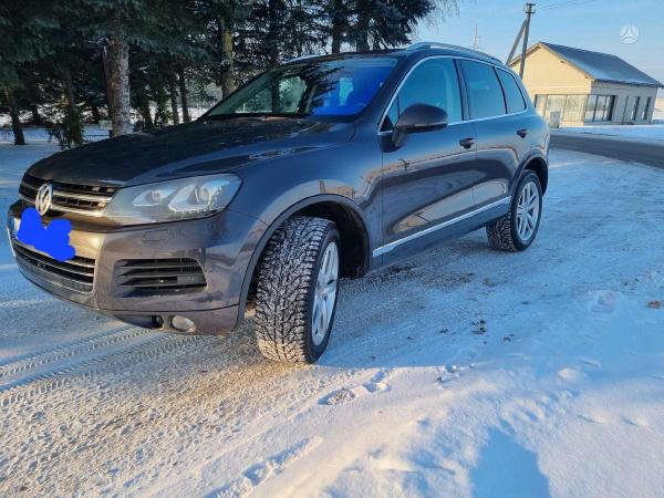 Brūns Volkswagen Touareg 2011 Marijampole, ar dzinēja tilpumu 3.00 L un nobraukumu 295 tūkst. km par 9550 €, foto 4 vietnē AUTOMOTO.COM.LV