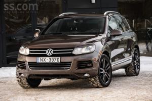 Brūns Volkswagen Touareg 2011 Jelgava, ar dzinēja tilpumu 3.00 L un nobraukumu 281 tūkst. km par 13200 €, foto  vietnē AUTOMOTO.COM.LV