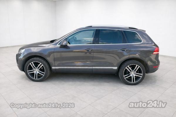 Brūns Volkswagen Touareg 2011 Tartu, ar dzinēja tilpumu 3.00 L un nobraukumu 97 tūkst. km par 18380 €, foto 3 vietnē AUTOMOTO.COM.LV