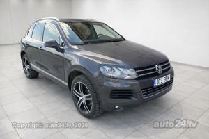 Brūns Volkswagen Touareg 2011 Tartu, ar dzinēja tilpumu 3.00 L un nobraukumu 97 tūkst. km par 18380 €, foto 4 vietnē AUTOMOTO.COM.LV