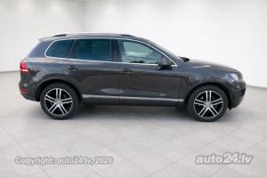 Brūns Volkswagen Touareg 2011 Tartu, ar dzinēja tilpumu 3.00 L un nobraukumu 97 tūkst. km par 18380 €, foto 5 vietnē AUTOMOTO.COM.LV