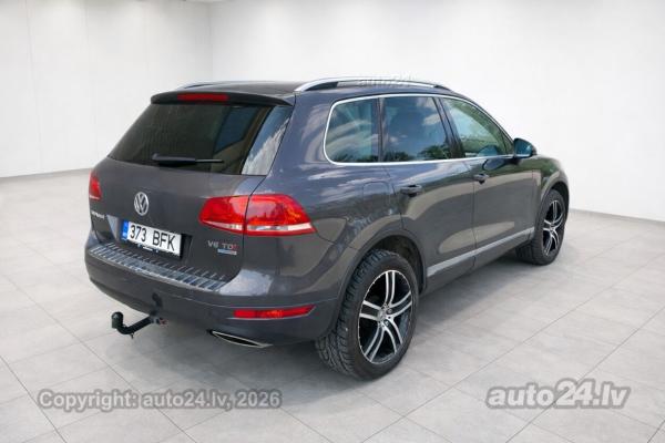 Brūns Volkswagen Touareg 2011 Tartu, ar dzinēja tilpumu 3.00 L un nobraukumu 97 tūkst. km par 18380 €, foto 6 vietnē AUTOMOTO.COM.LV