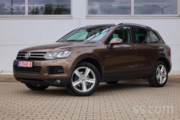Brown Volkswagen Touareg 2011 in Riga, with an engine capacity of 3.00 L and mileage of 0 thousand km for 7995 €, photo 1 on AUTOMOTO.COM.LV