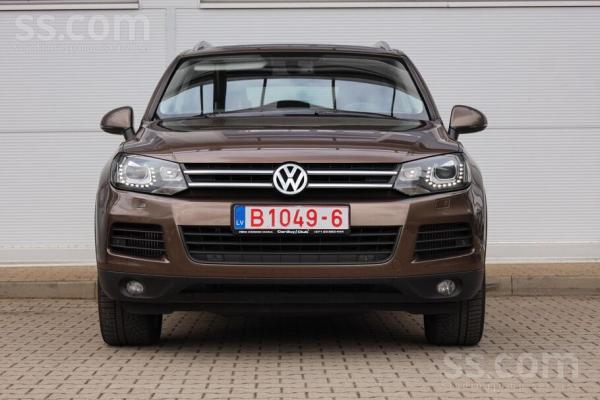 Brown Volkswagen Touareg 2011 in Riga, with an engine capacity of 3.00 L and mileage of 0 thousand km for 7995 €, photo 3 on AUTOMOTO.COM.LV