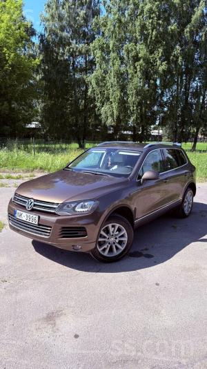 Brūns Volkswagen Touareg 2011 Rīga, ar dzinēja tilpumu 3.00 L un nobraukumu 498 tūkst. km par 8250 €, foto  vietnē AUTOMOTO.COM.LV