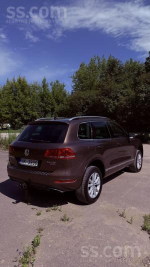 Brūns Volkswagen Touareg 2011 Rīga, ar dzinēja tilpumu 3.00 L un nobraukumu 498 tūkst. km par 8250 €, foto 5 vietnē AUTOMOTO.COM.LV
