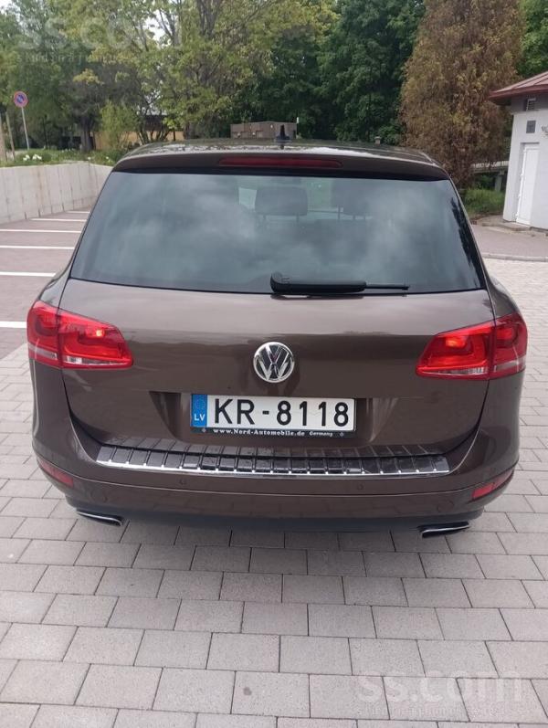 Brūns Volkswagen Touareg 2011 Valmiera, ar dzinēja tilpumu 3.00 L un nobraukumu 334 tūkst. km par 9750 €, foto 4 vietnē AUTOMOTO.COM.LV