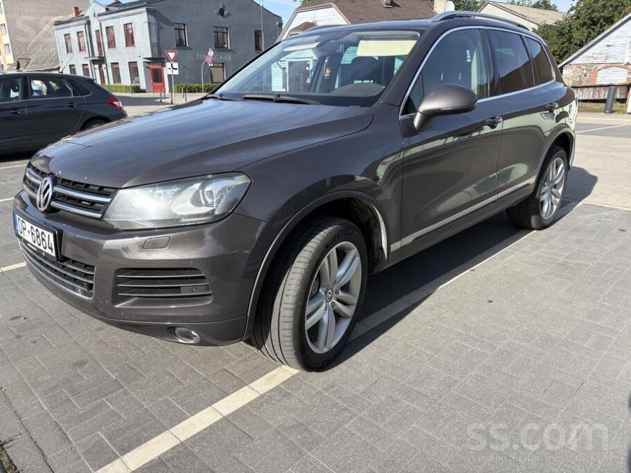 Brūns Volkswagen Touareg 2011 Rīga, ar dzinēja tilpumu 3.00 L un nobraukumu 506 tūkst. km par 8000 €, foto 1 vietnē AUTOMOTO.COM.LV