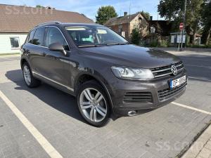 Brūns Volkswagen Touareg 2011 Rīga, ar dzinēja tilpumu 3.00 L un nobraukumu 506 tūkst. km par 8000 €, foto 3 vietnē AUTOMOTO.COM.LV