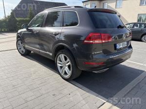 Brūns Volkswagen Touareg 2011 Rīga, ar dzinēja tilpumu 3.00 L un nobraukumu 506 tūkst. km par 8000 €, foto 5 vietnē AUTOMOTO.COM.LV
