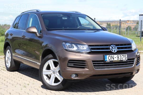 Brūns Volkswagen Touareg 2011 Rīga, ar dzinēja tilpumu 3.00 L un nobraukumu 282 tūkst. km par 9200 €, foto 1 vietnē AUTOMOTO.COM.LV
