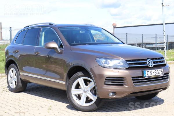 Brūns Volkswagen Touareg 2011 Rīga, ar dzinēja tilpumu 3.00 L un nobraukumu 282 tūkst. km par 9200 €, foto 2 vietnē AUTOMOTO.COM.LV