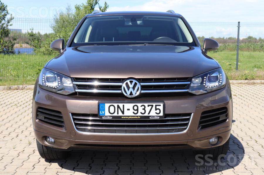 Brūns Volkswagen Touareg 2011 Rīga, ar dzinēja tilpumu 3.00 L un nobraukumu 282 tūkst. km par 9250 €, foto 4 vietnē AUTOMOTO.COM.LV