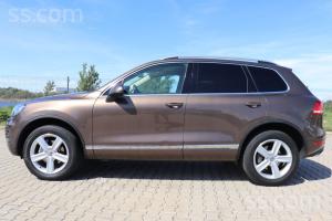 Brūns Volkswagen Touareg 2011 Rīga, ar dzinēja tilpumu 3.00 L un nobraukumu 282 tūkst. km par 9250 €, foto 13 vietnē AUTOMOTO.COM.LV